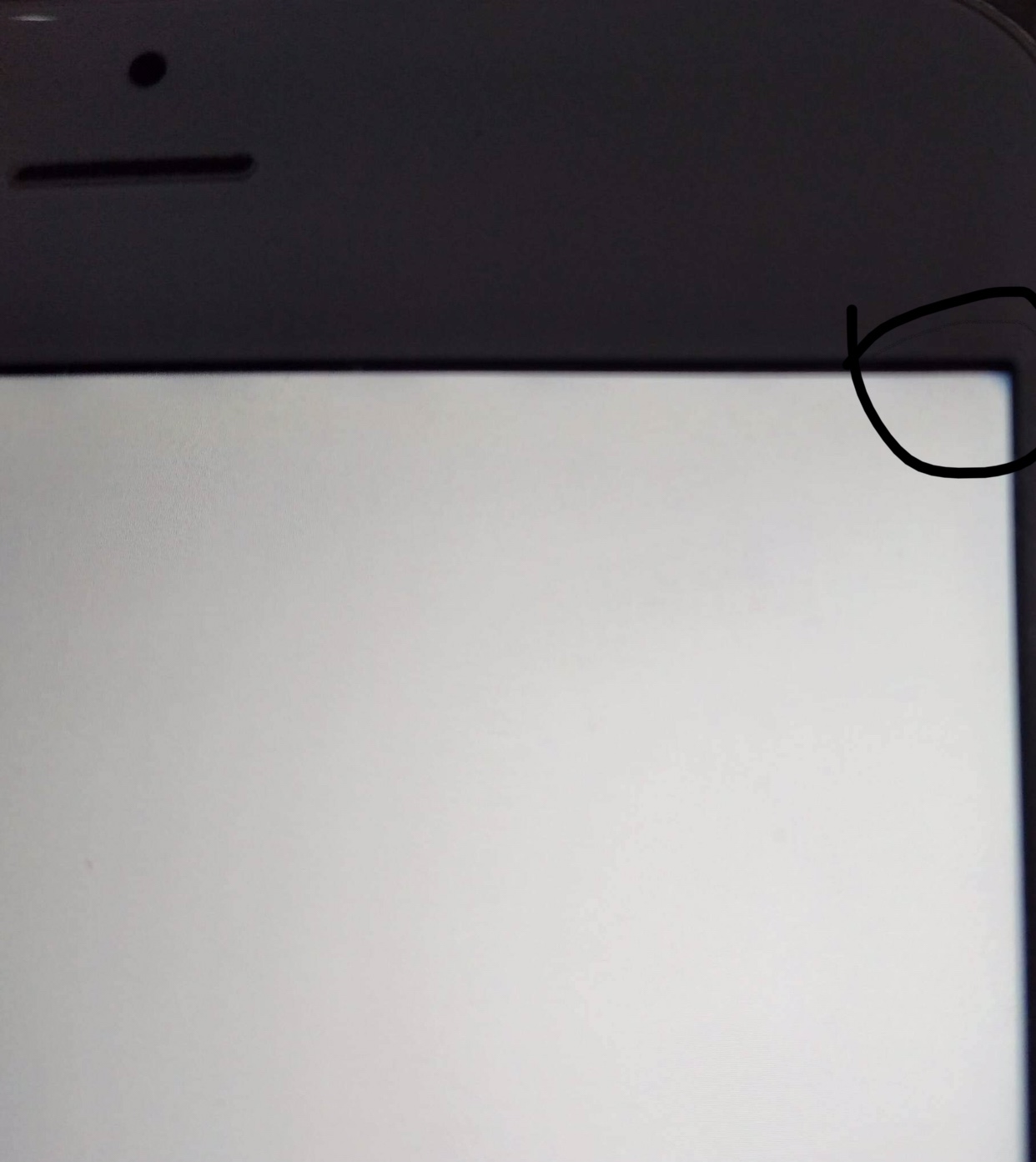 Small black shadow in the top right corne… - Apple Community