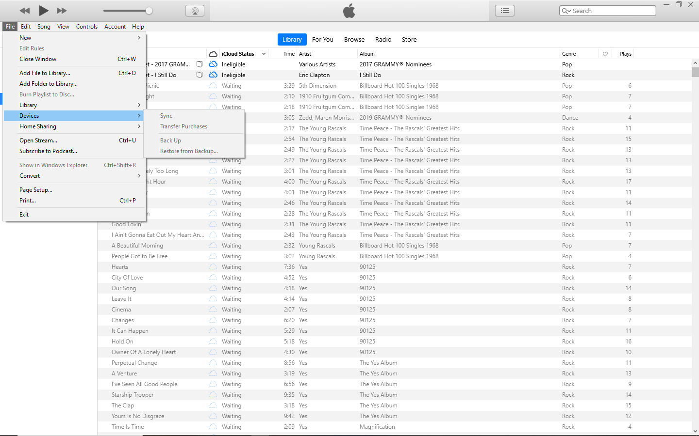 Songs Stuck "Waiting"-Why? - Apple Community