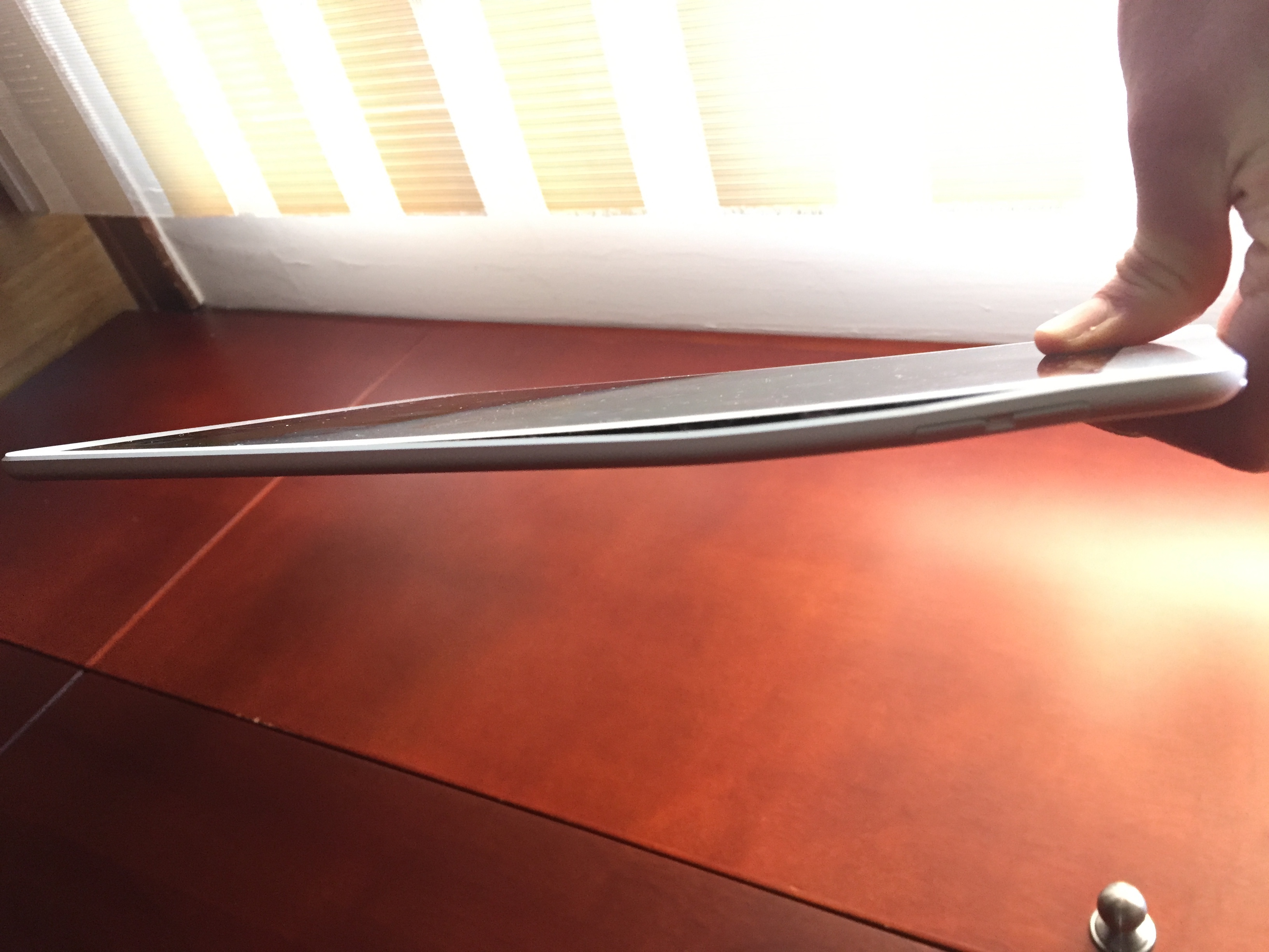 Screen popping of from iPad’s Frame. - Apple Community